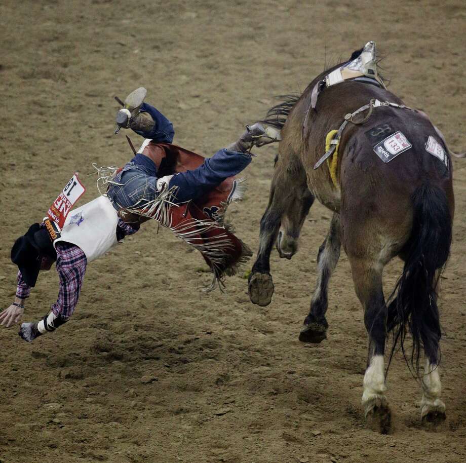 Riders hang on at Rodeo Finals - Houston Chronicle