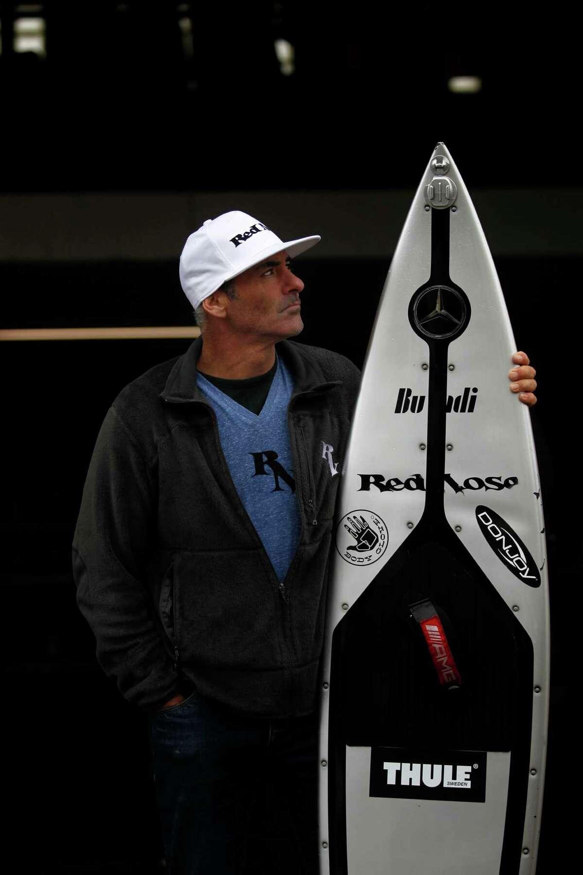 Surfers ride big waves