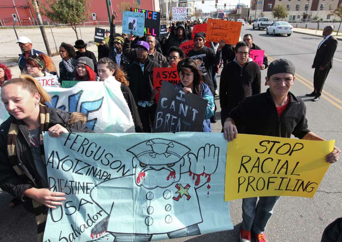 S.A. marchers conduct peaceful protest of police shootings