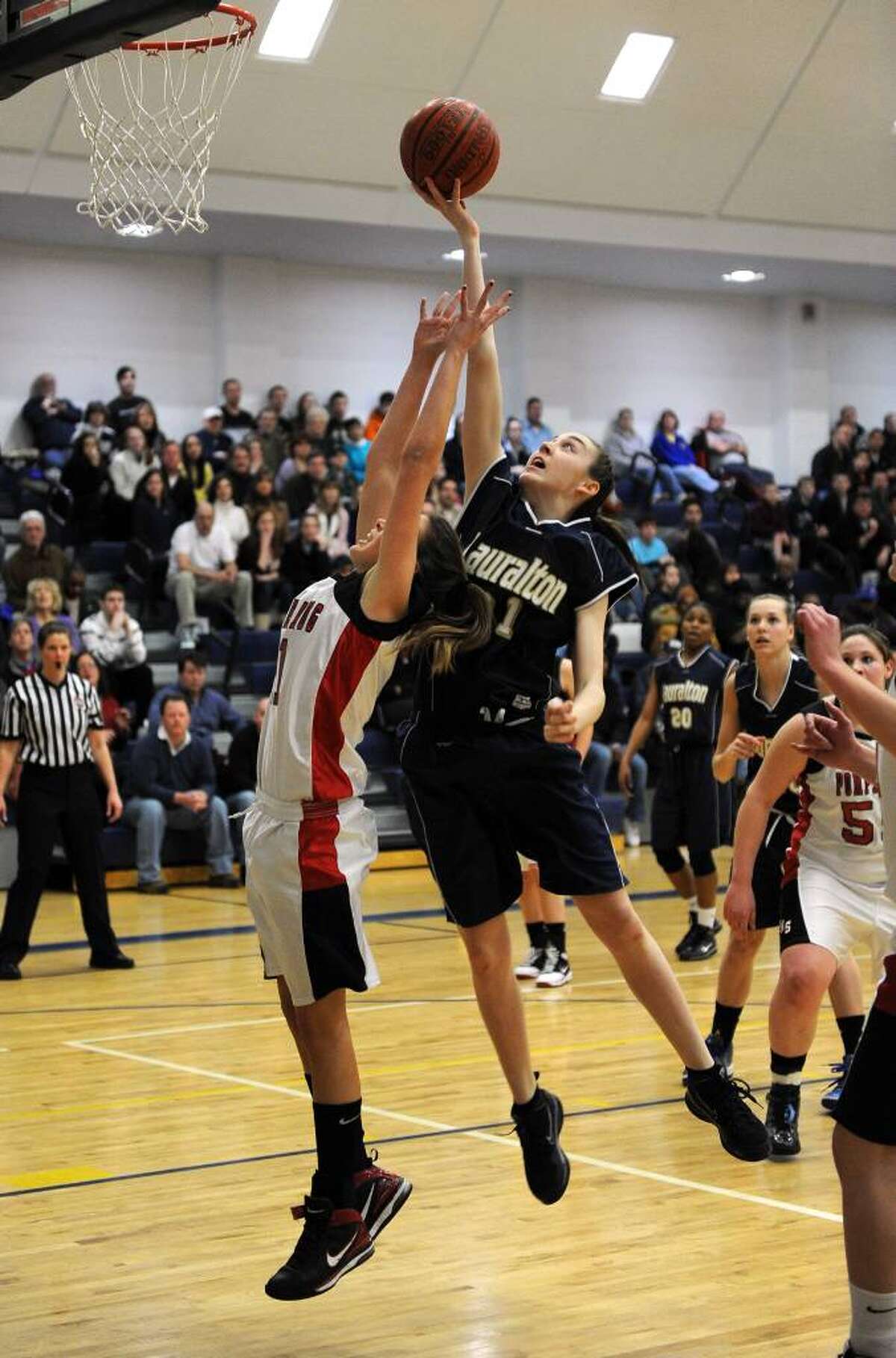 Pomperaug topples Lauralton Hall to win SWC girls basketball title