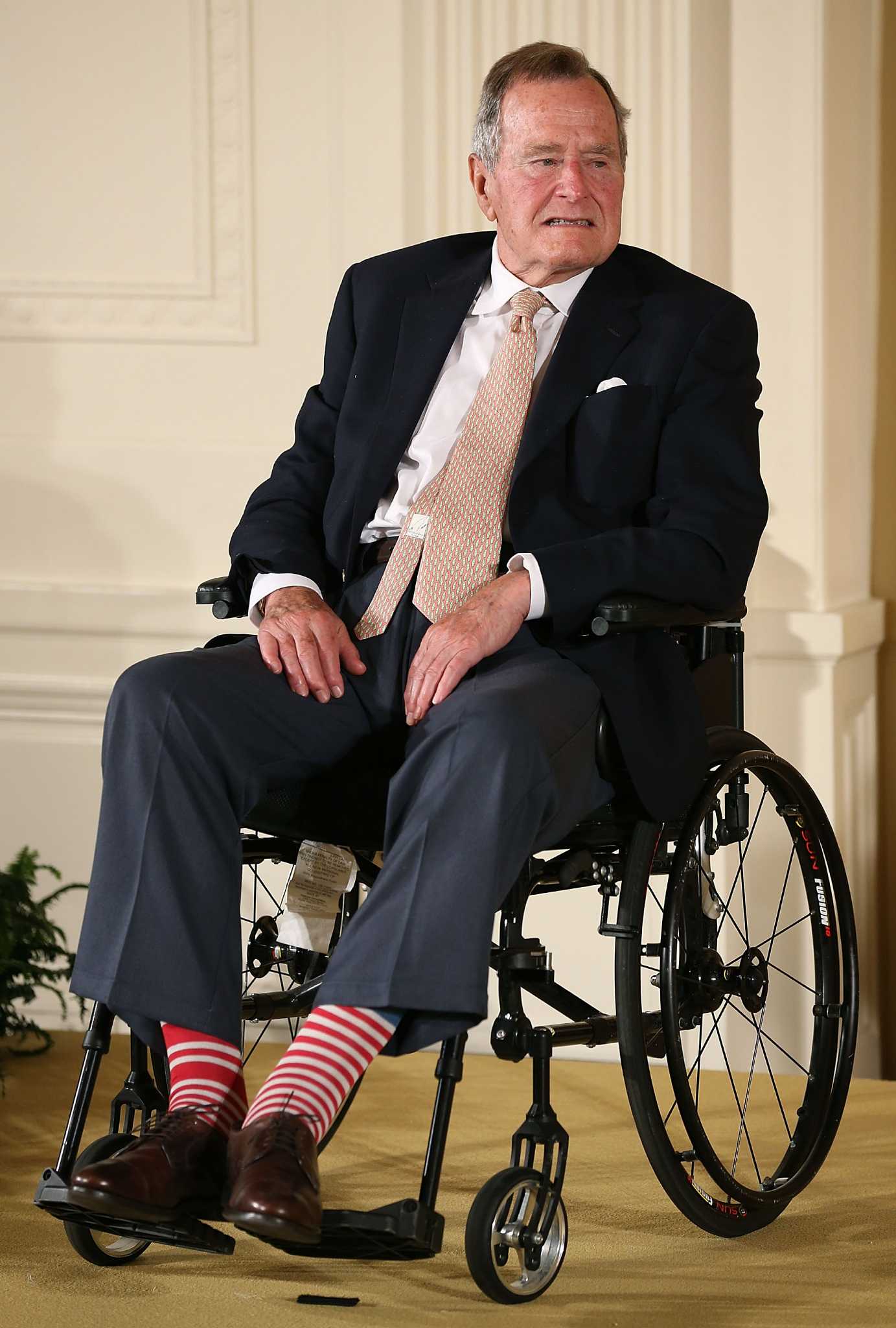 Former President George H.W. Bush remains hospitalized