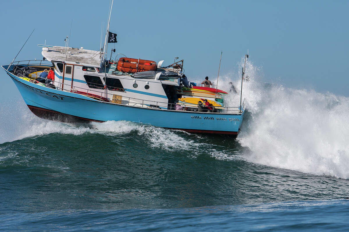 Frank Quirarte snaps shots of surfers, and saves them, too