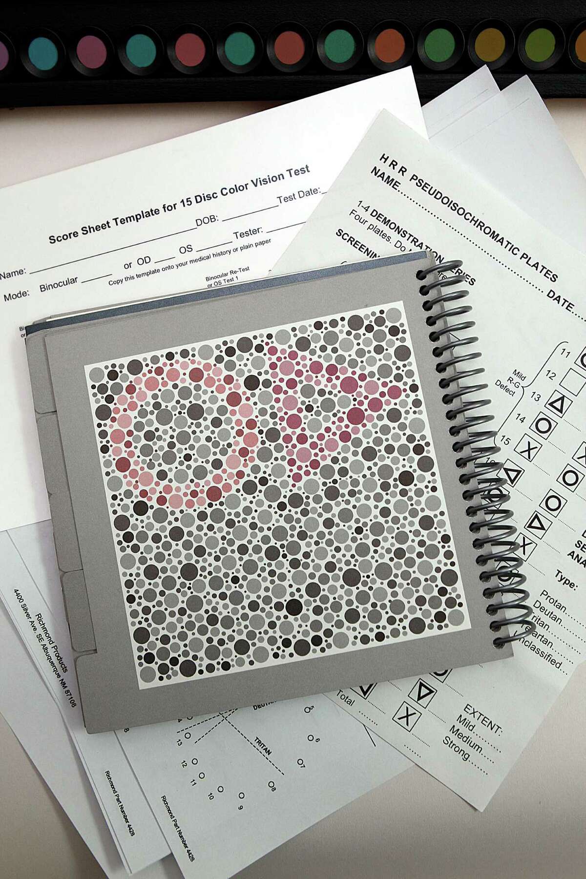 Glasses help color-blind see trees of green, red roses, too