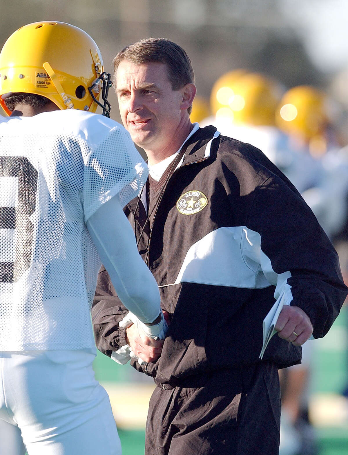 Churchill coach Hill ends 34-year career