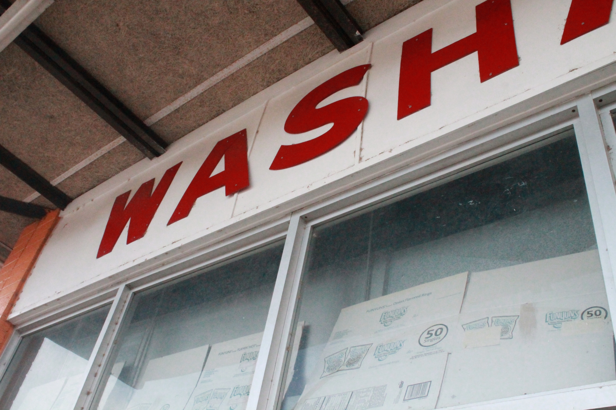 Sign Language: The neighborhood washateria