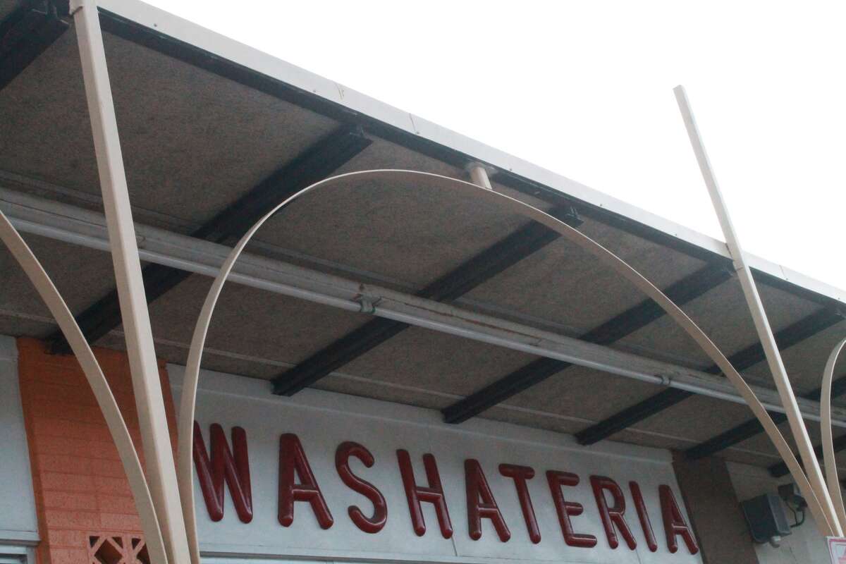 Sign Language: The neighborhood washateria