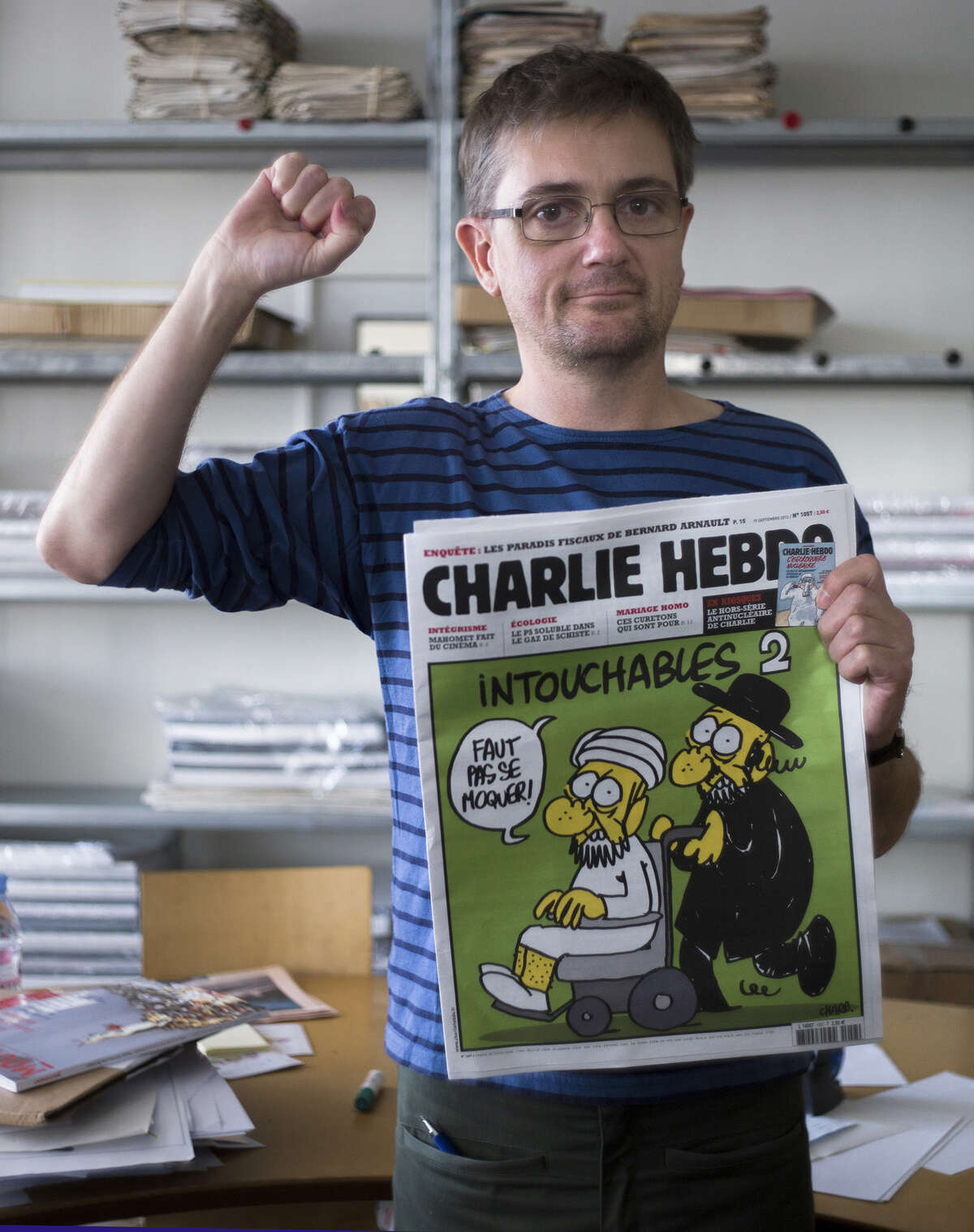 Hundreds gather in S.F. to grieve after Charlie Hebdo massacre