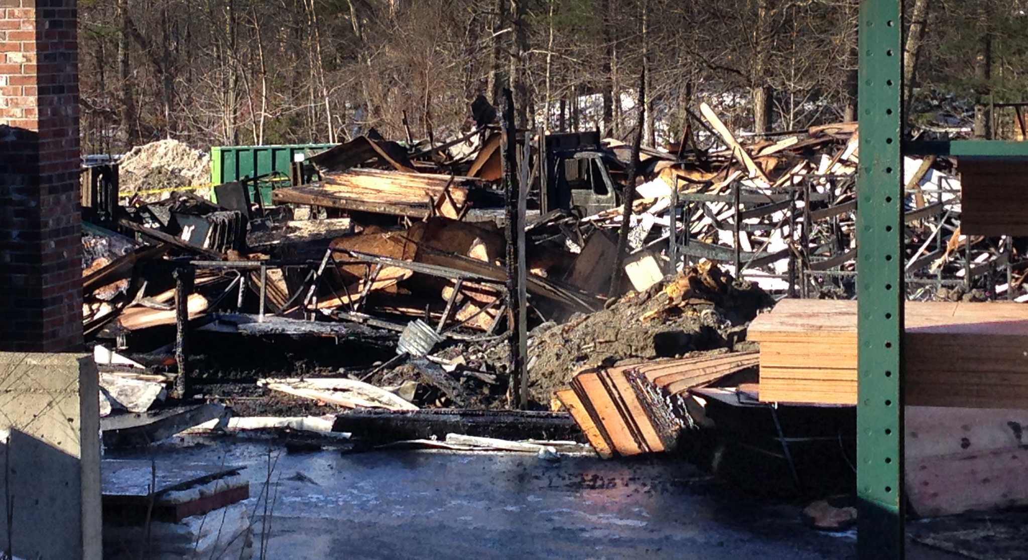 Area fire departments battle massive lumberyard blaze