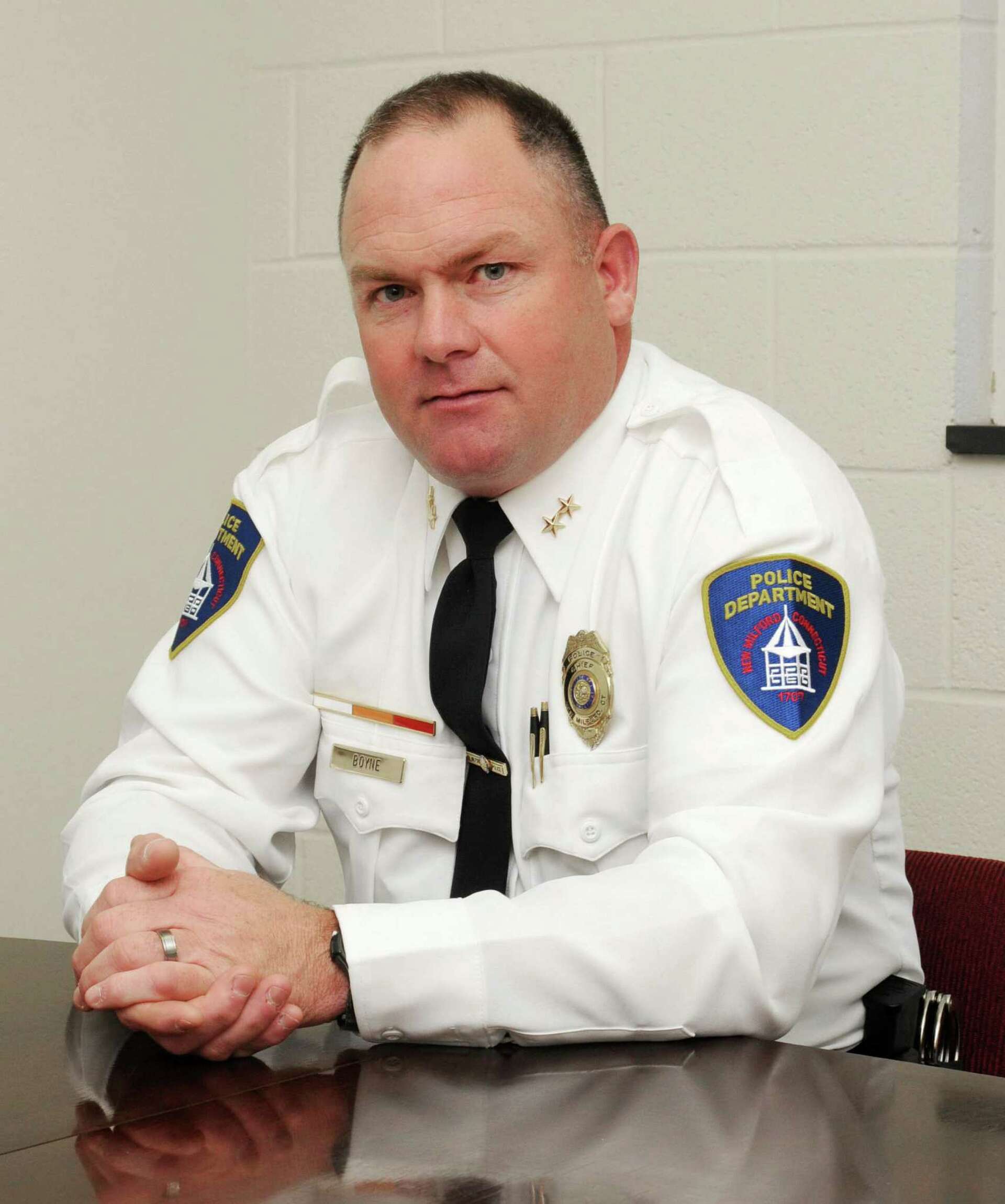 New Milford police chief's SUV flips over in three-car crash