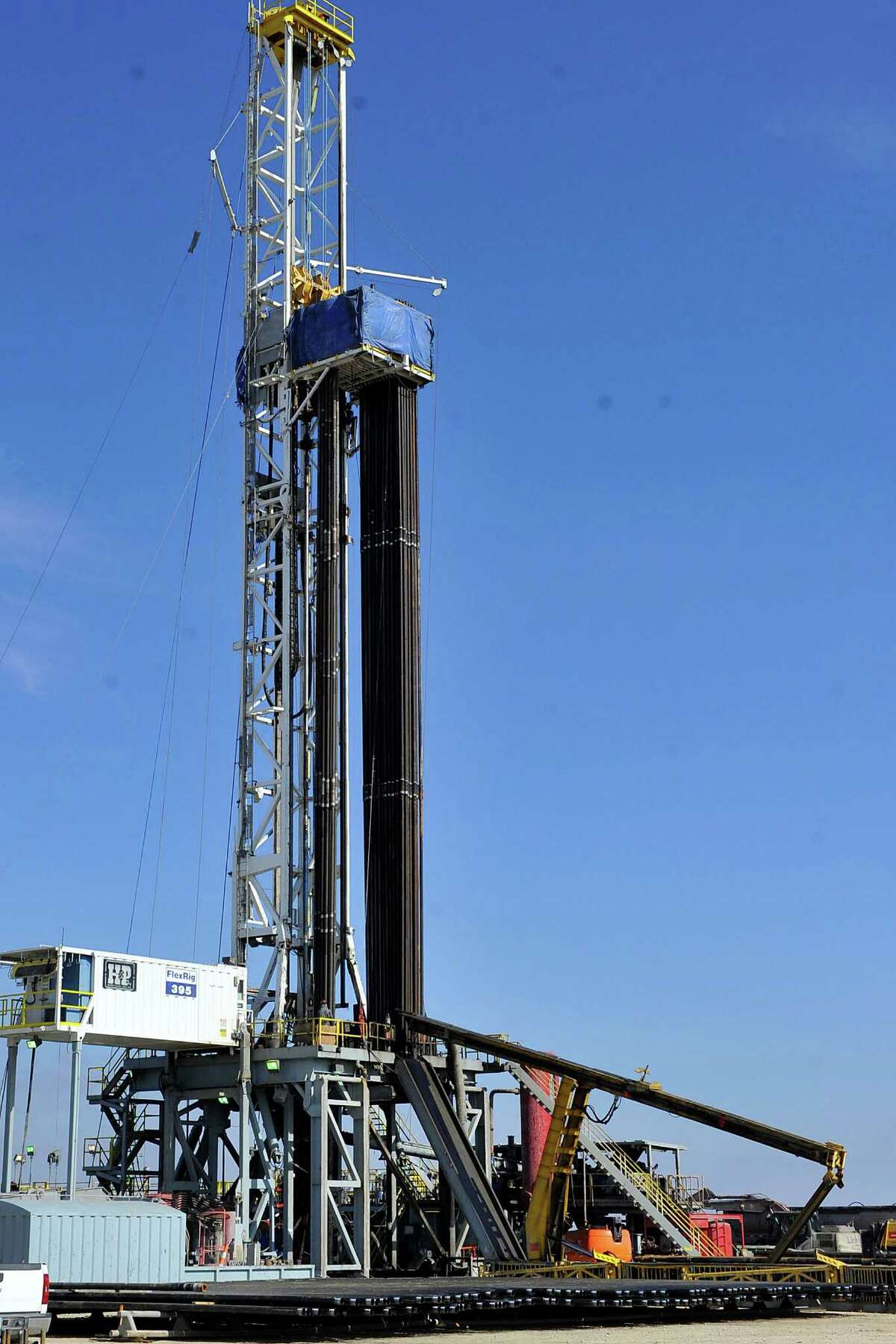 As rigs idle, a town in oil country reels