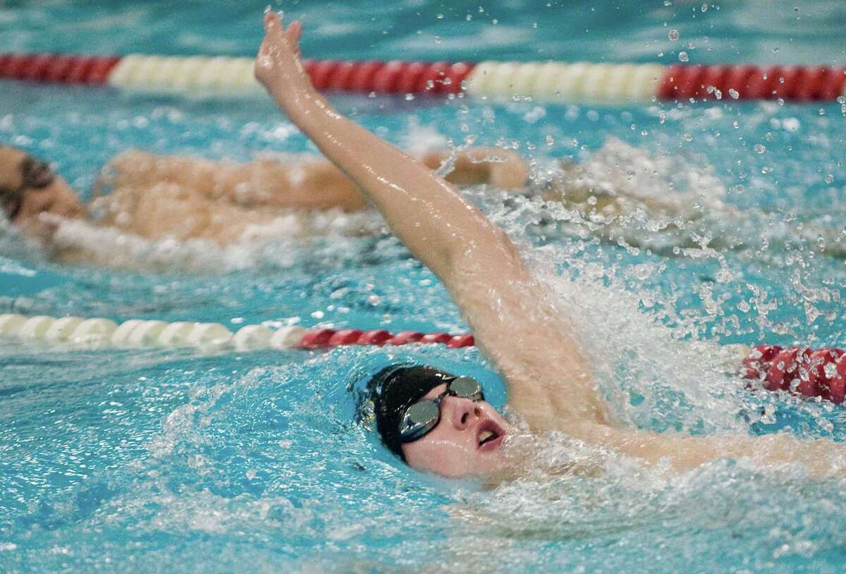 Pomperaug wins clash of SWC swimming titans