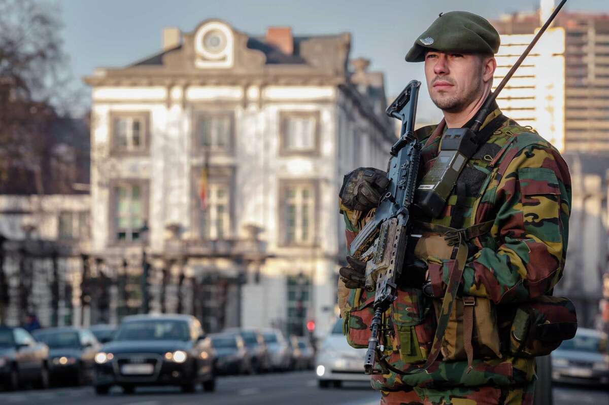 Paratroopers reinforce police as Belgium raises terror alert