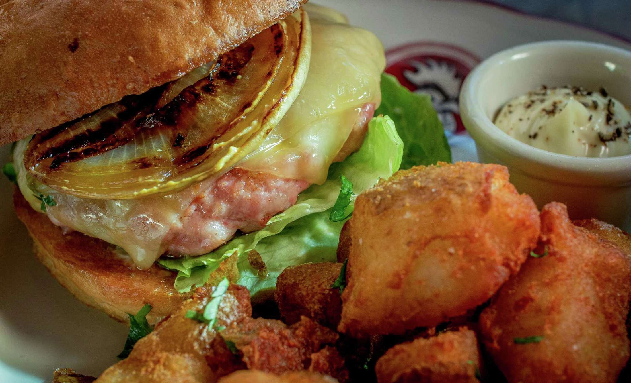 Restaurant review: Meat to the max at cocky Cockscomb in S.F.