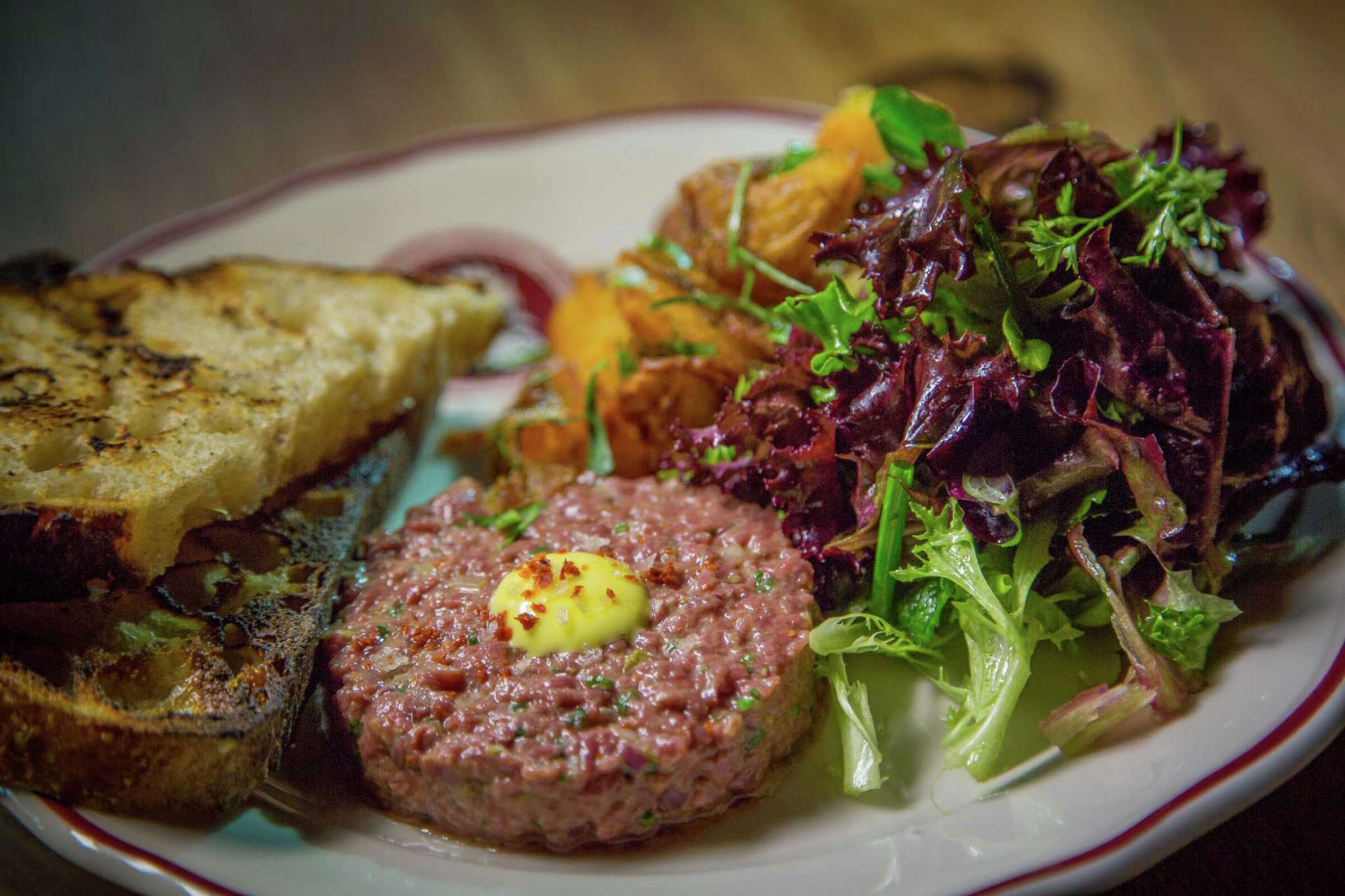 Restaurant review: Meat to the max at cocky Cockscomb in S.F.