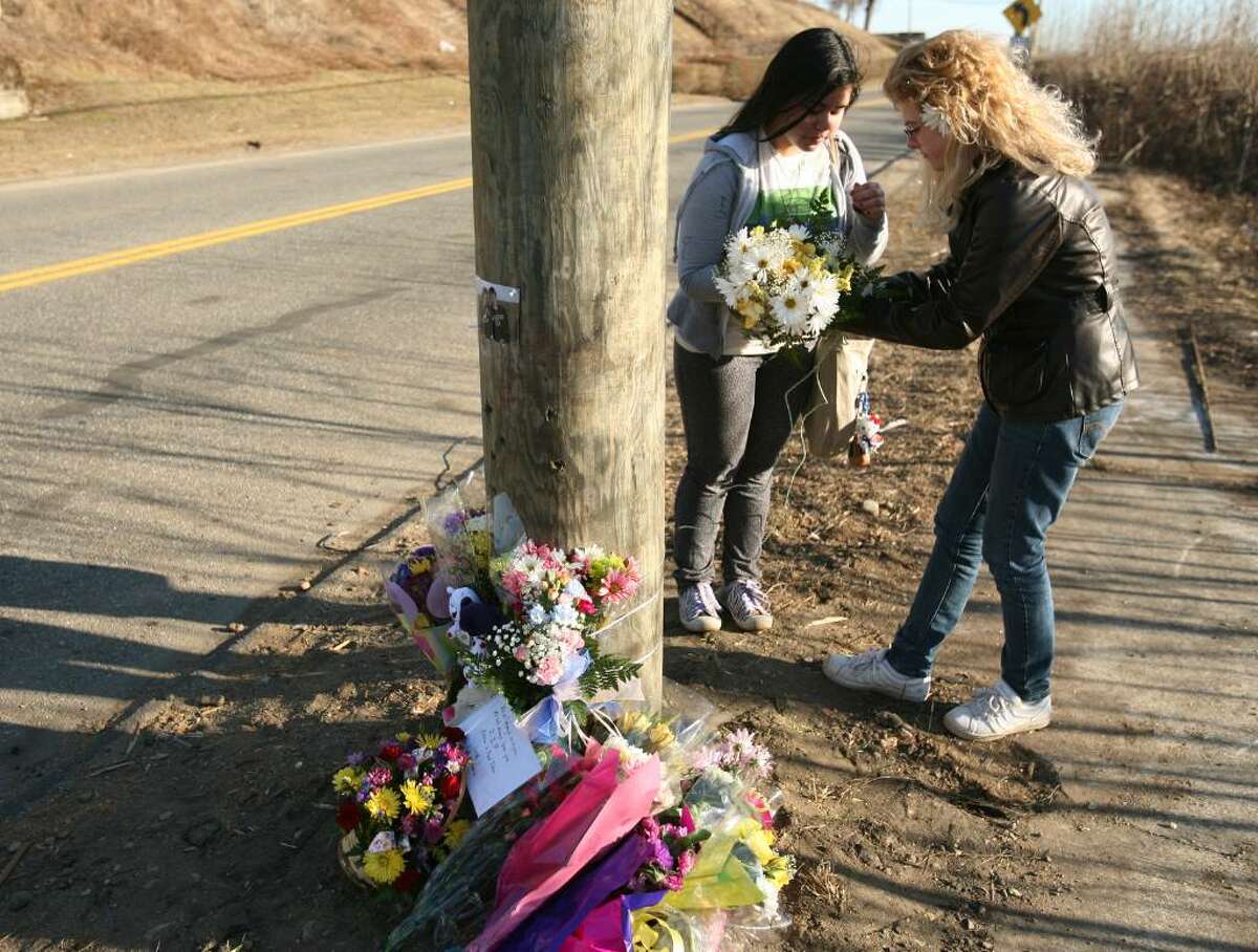 Mourners remember Milford siblings killed in crash