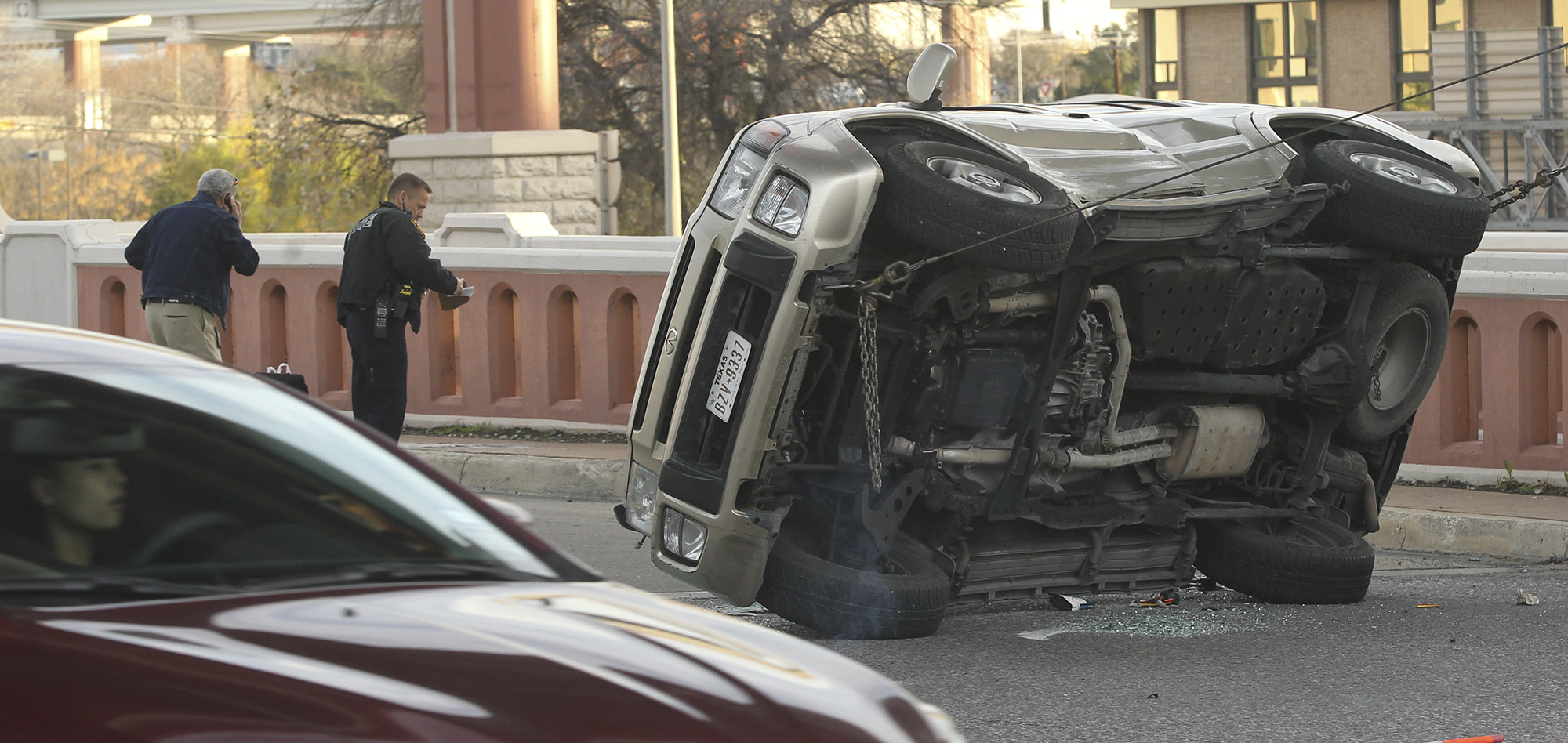 Police: SUV rolls over after running red light on North Side