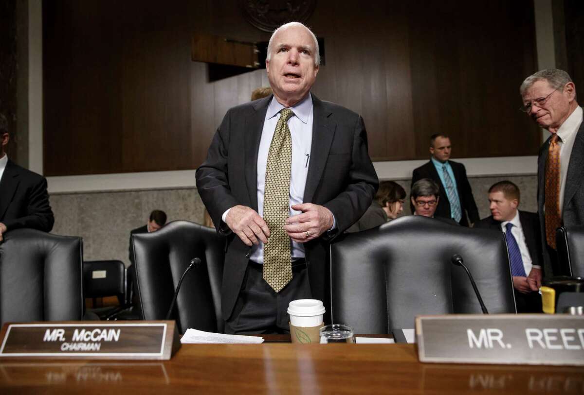 McCain to protesters: 'Get out of here, you low-life scum'