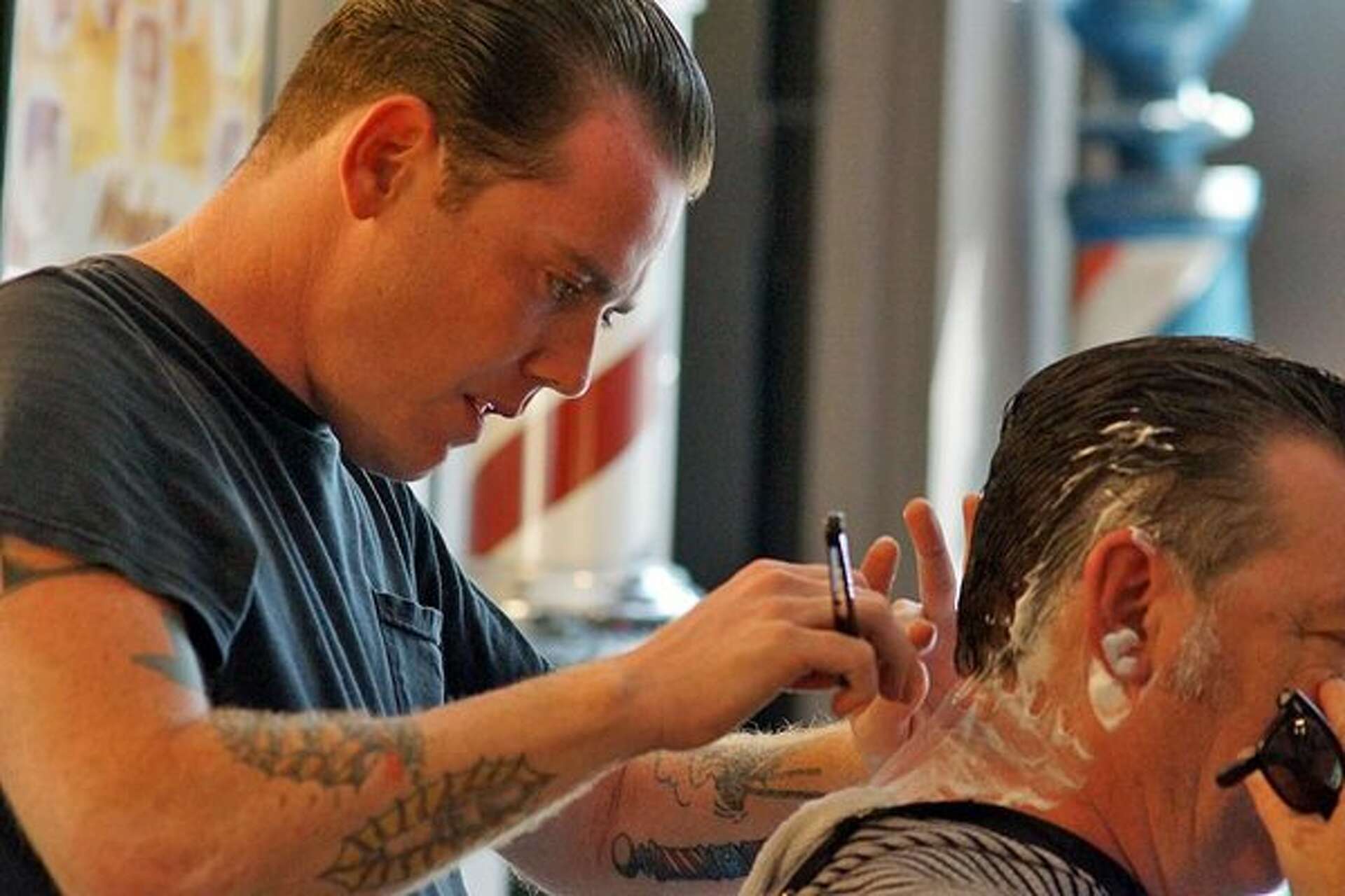 New barbershops with an old-school feel invade Houston