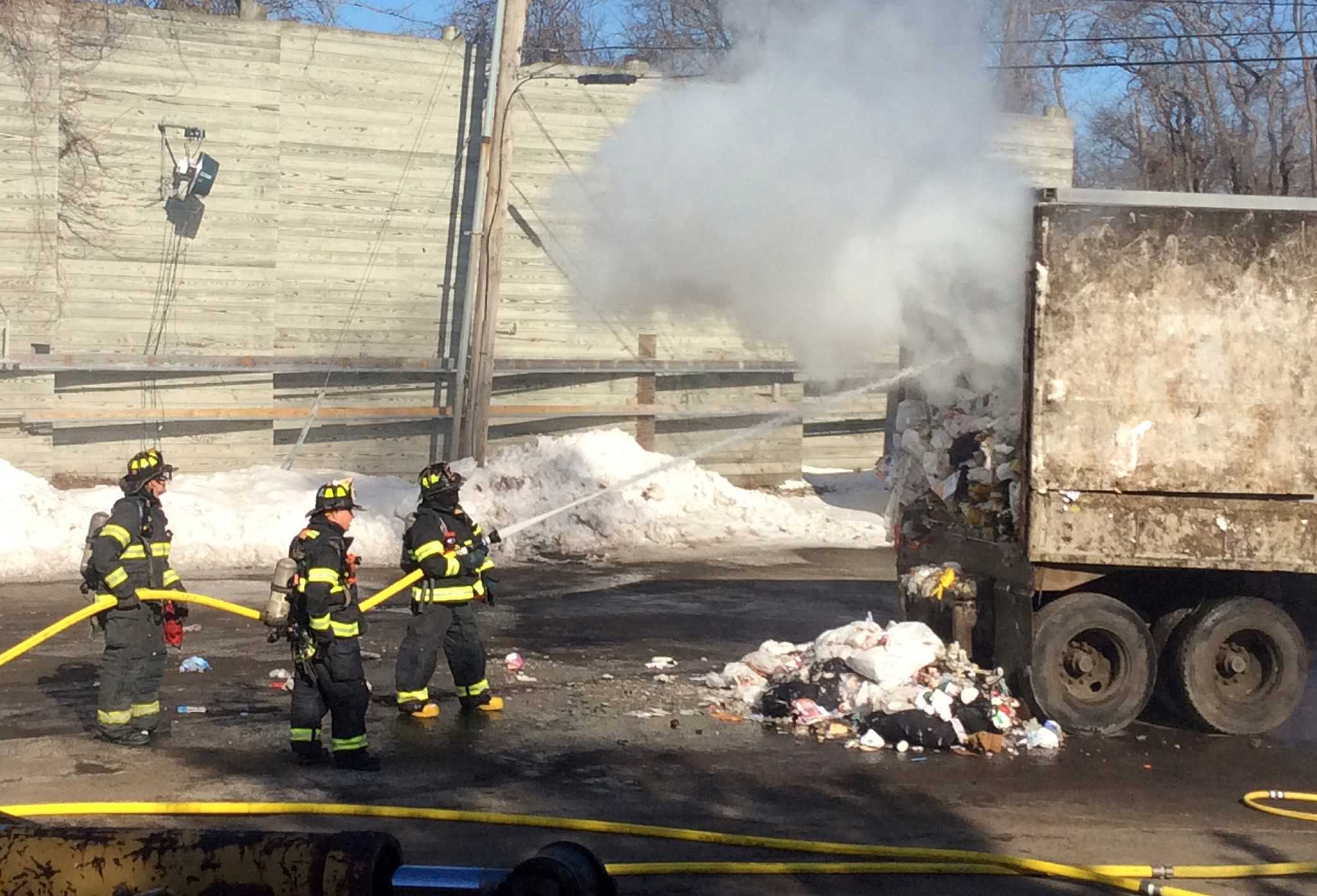 Frozen fire hydrants hamper firefighters battling garbage truck blaze
