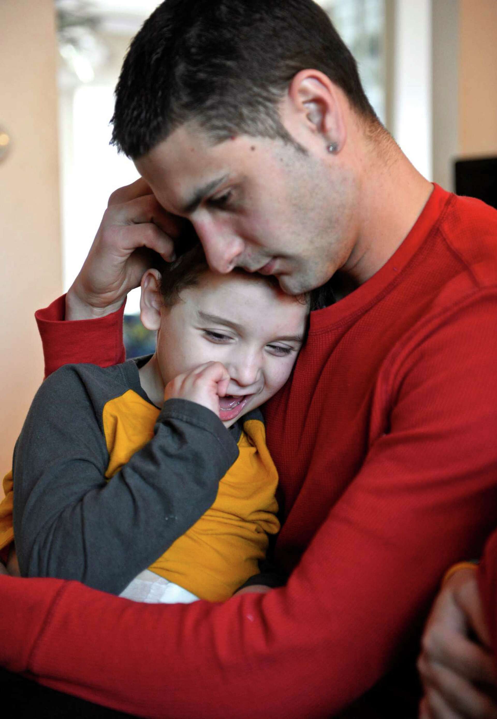 Video of Brookfield dad singing to disabled son goes viral