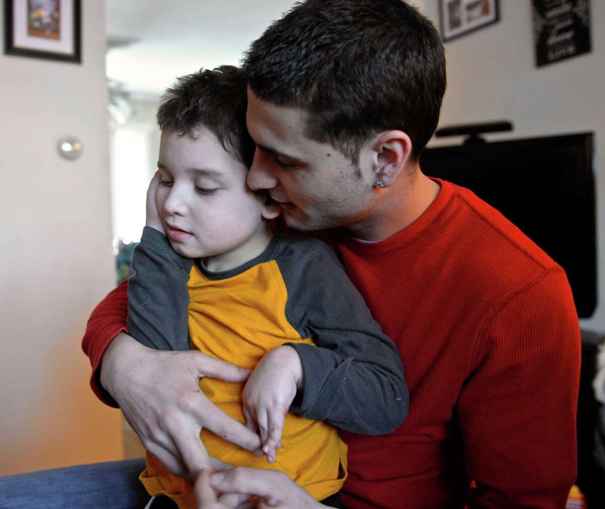 Video of Brookfield dad singing to disabled son goes viral