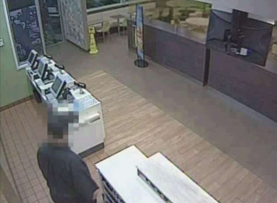 Houston fast-food robbery caught on tape - Houston Chronicle
