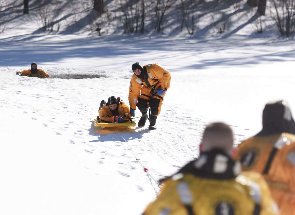 Experts on thin ice: firefighters practice winter water rescues