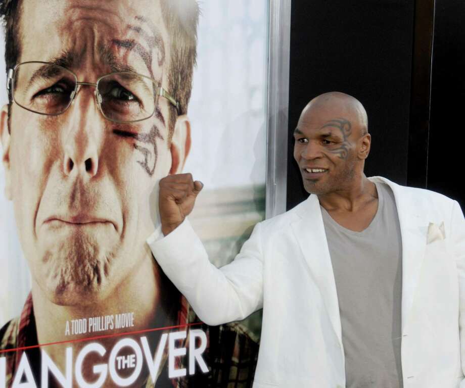 George Foreman, Mike Tyson, and other celebrities who have exotic pets ...