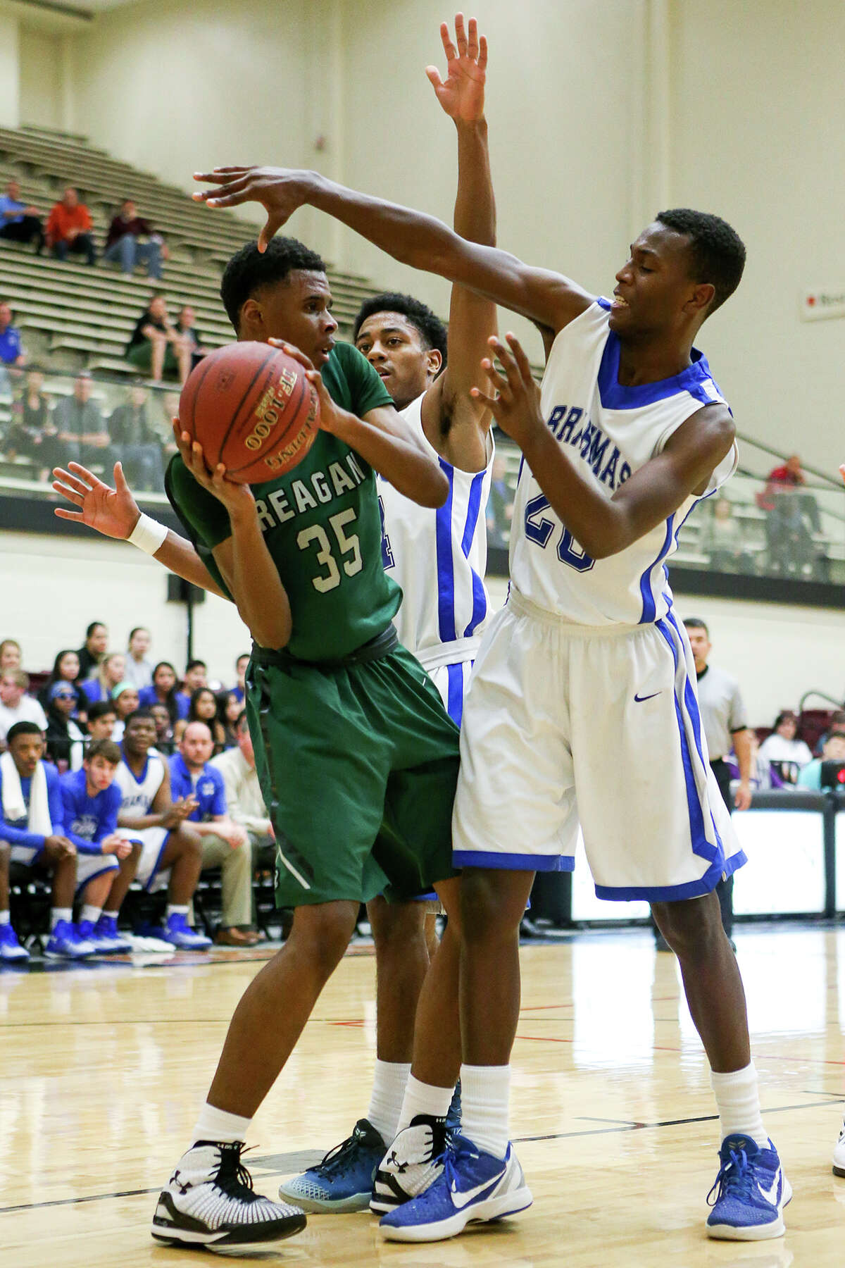 Reagan beats MacArthur to stay atop district standings