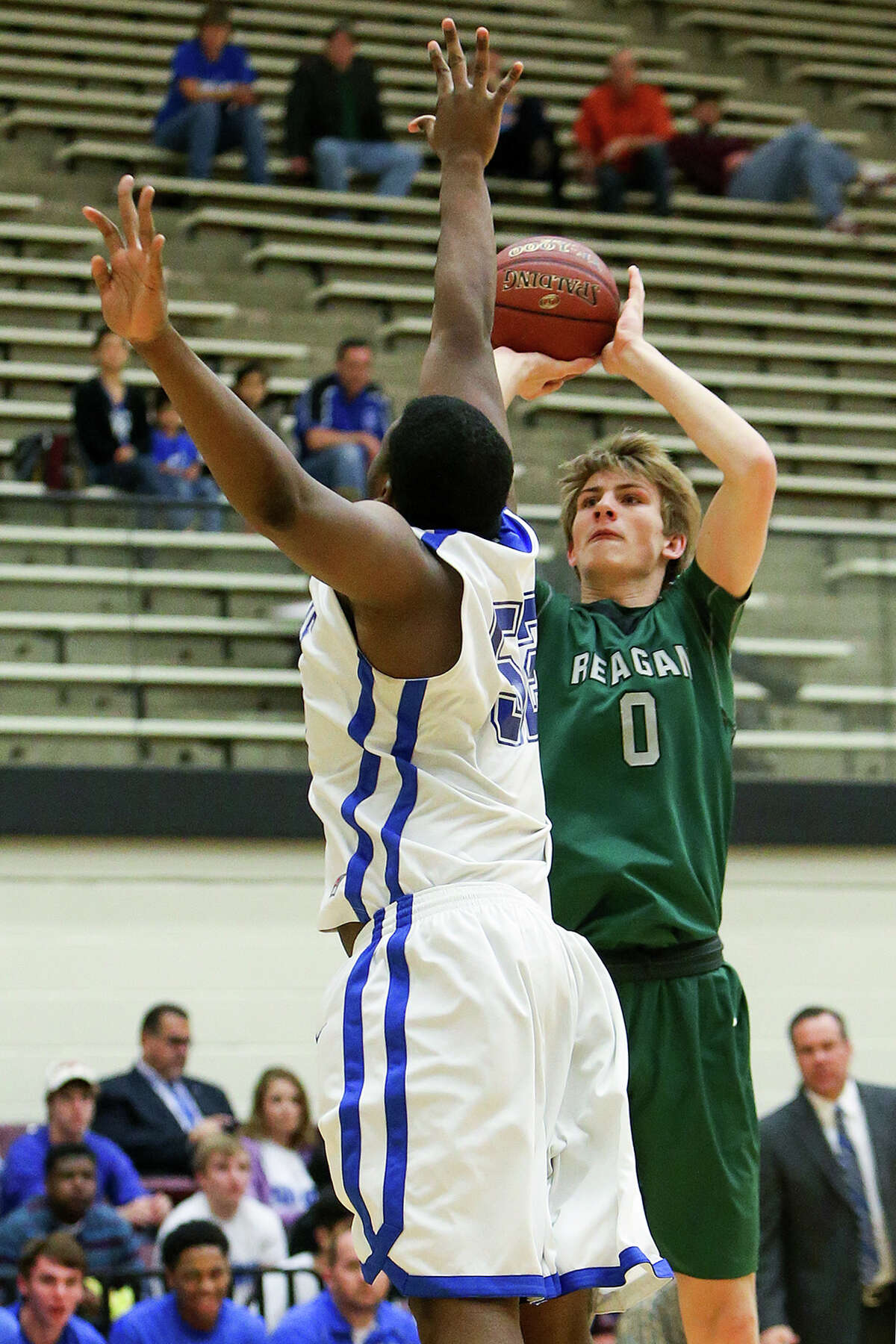 Reagan beats MacArthur to stay atop district standings