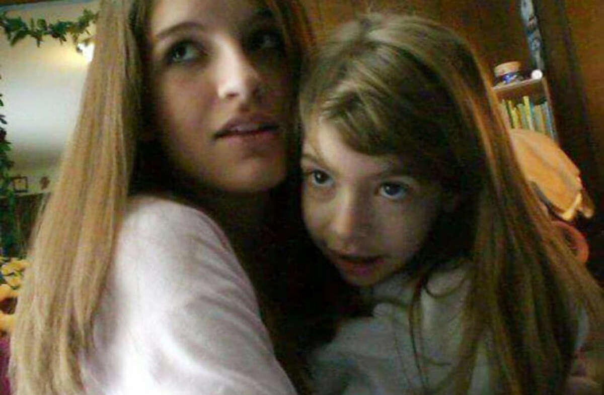 Community tries to lift burden for family devastated by Huntington's ...