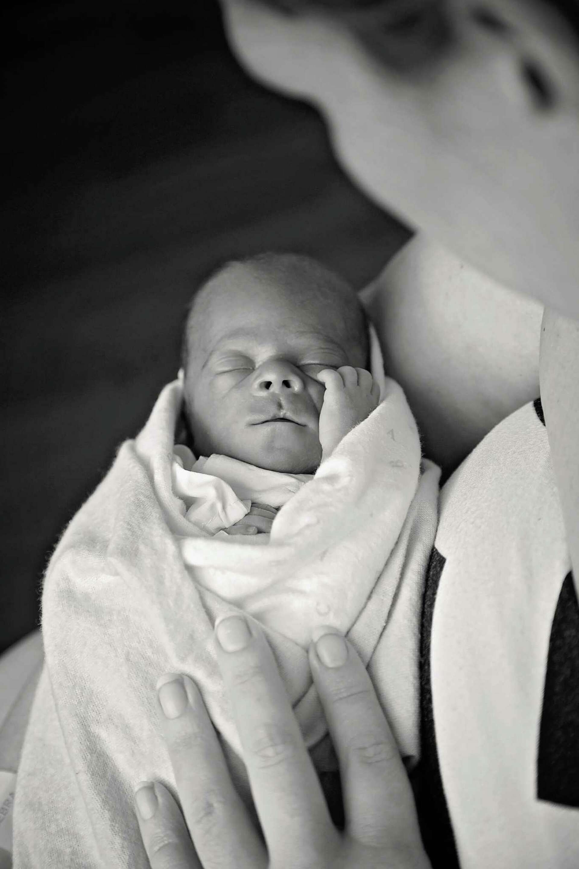 Volunteer photographers preserve families' memories of babies lost at birth