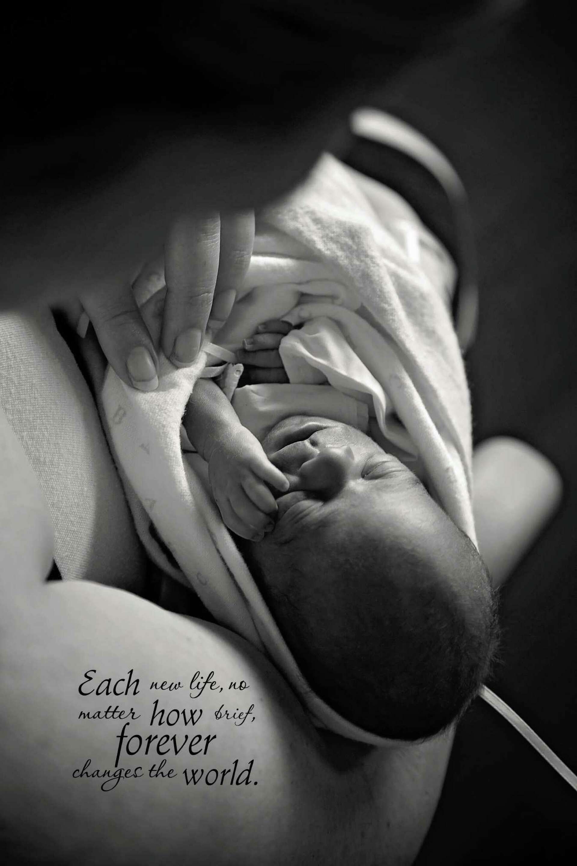 Volunteer photographers preserve families' memories of babies lost at birth