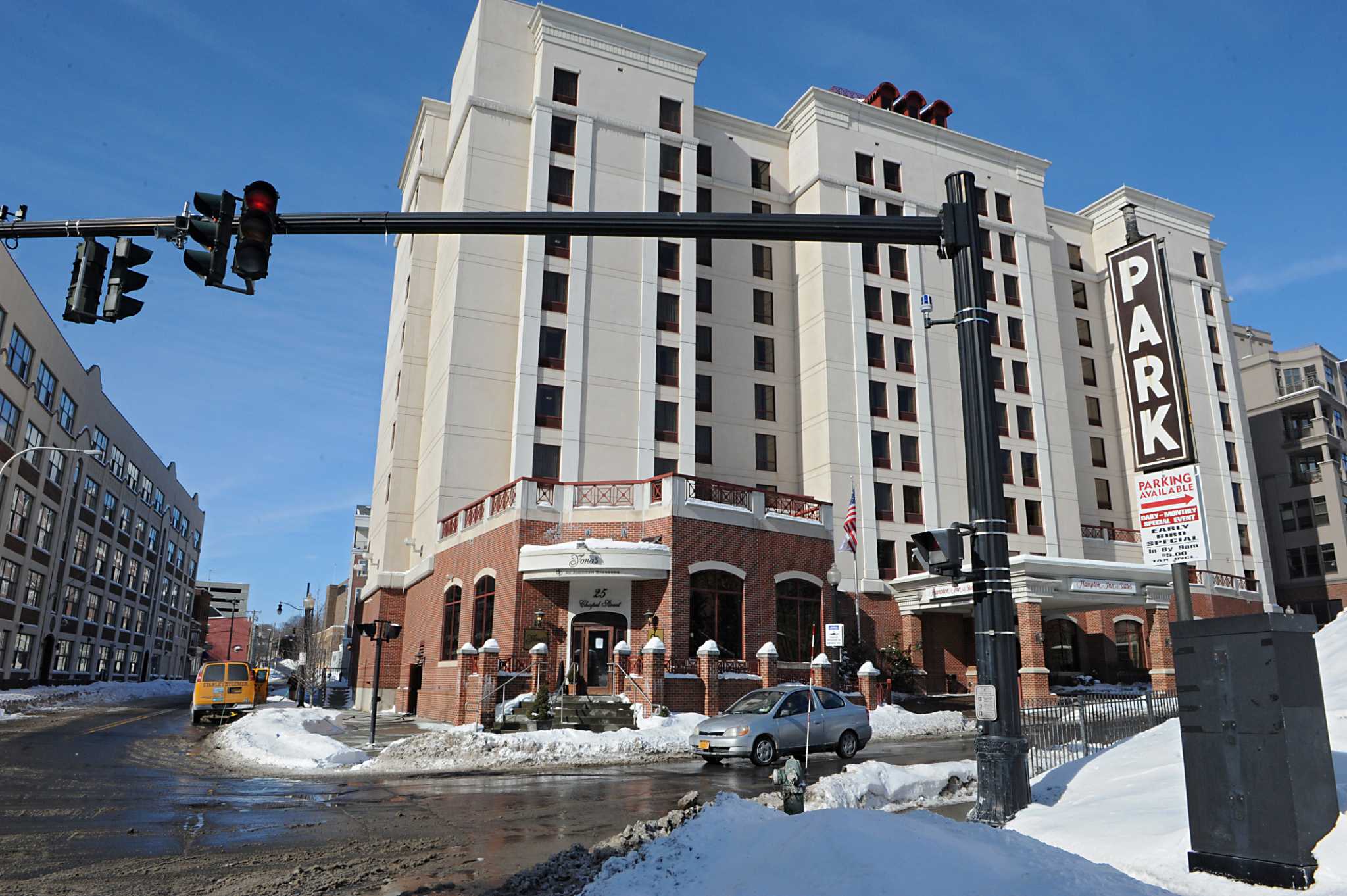 Woman claims Albany Hampton Inn employee filmed her in shower