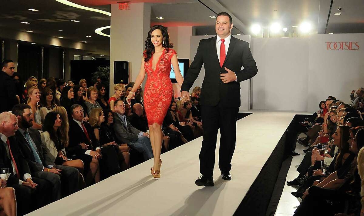 Texans players, power couples work runway at Tootsies