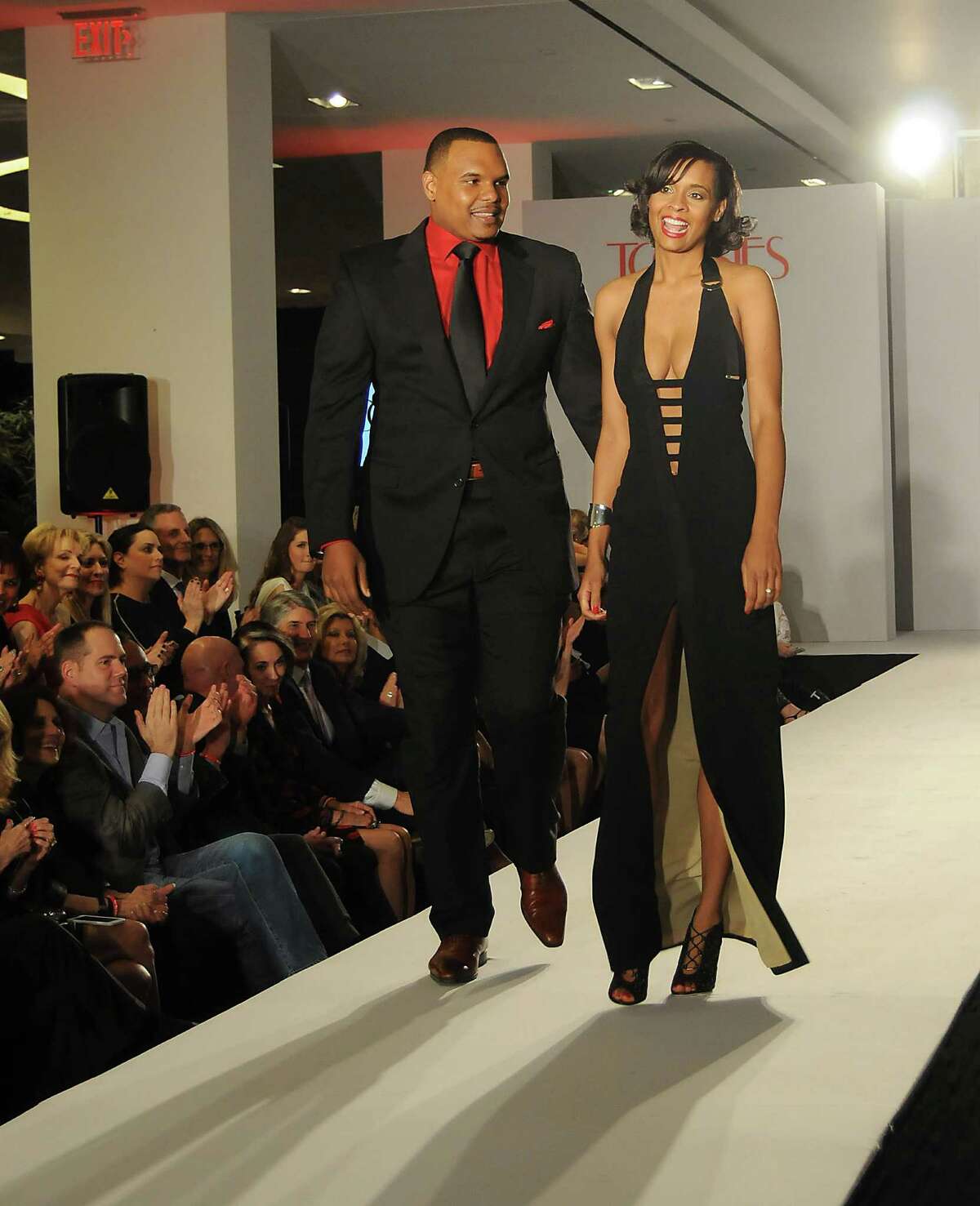 Texans players, power couples work runway at Tootsies