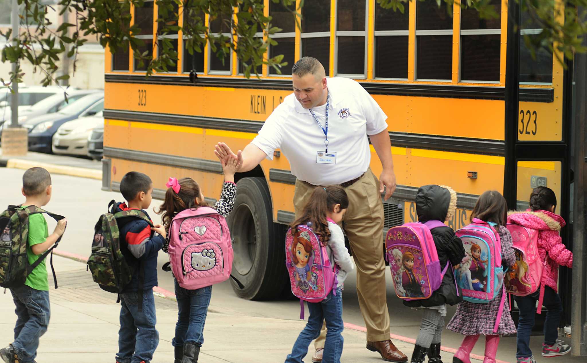 Volunteer program helps bring dads back to school