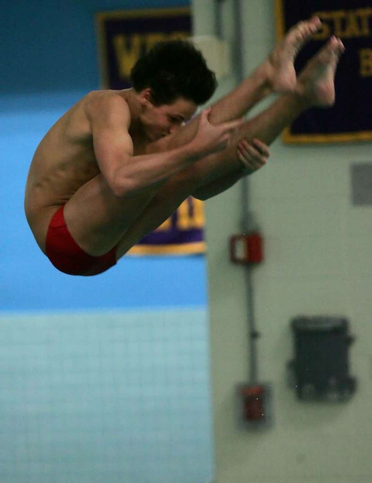 Greenwich's O'Connell wins third straight FCIAC diving crown