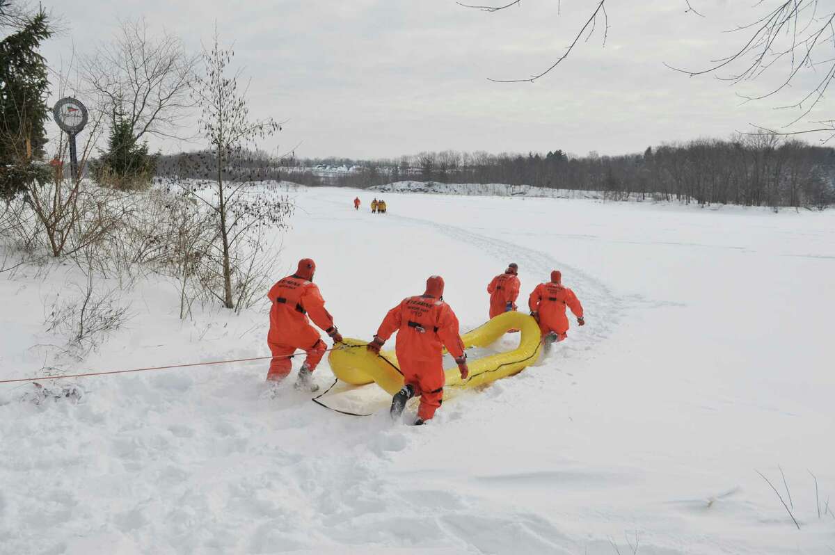 Firefighters practice cold-weather drills