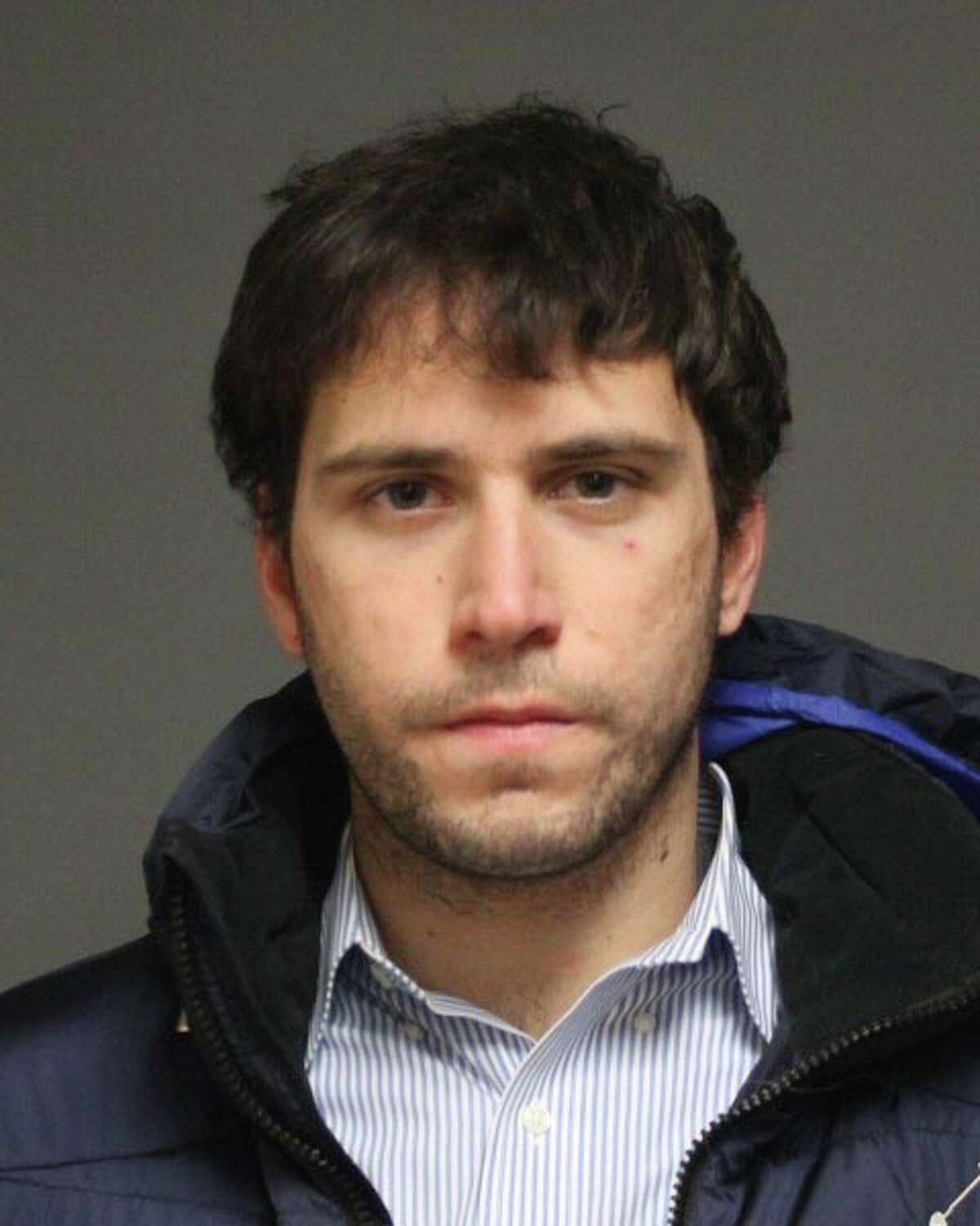 Man charged with cashing forged checks swiped from mom