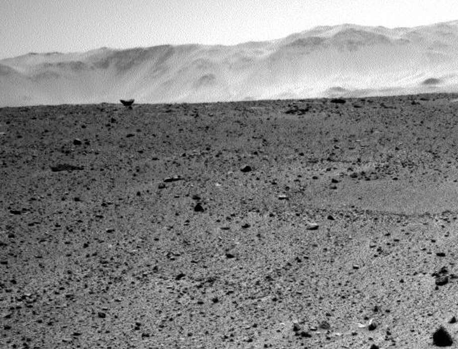 Unusual object on Mars could be crashed UFO, believers claim - Houston ...