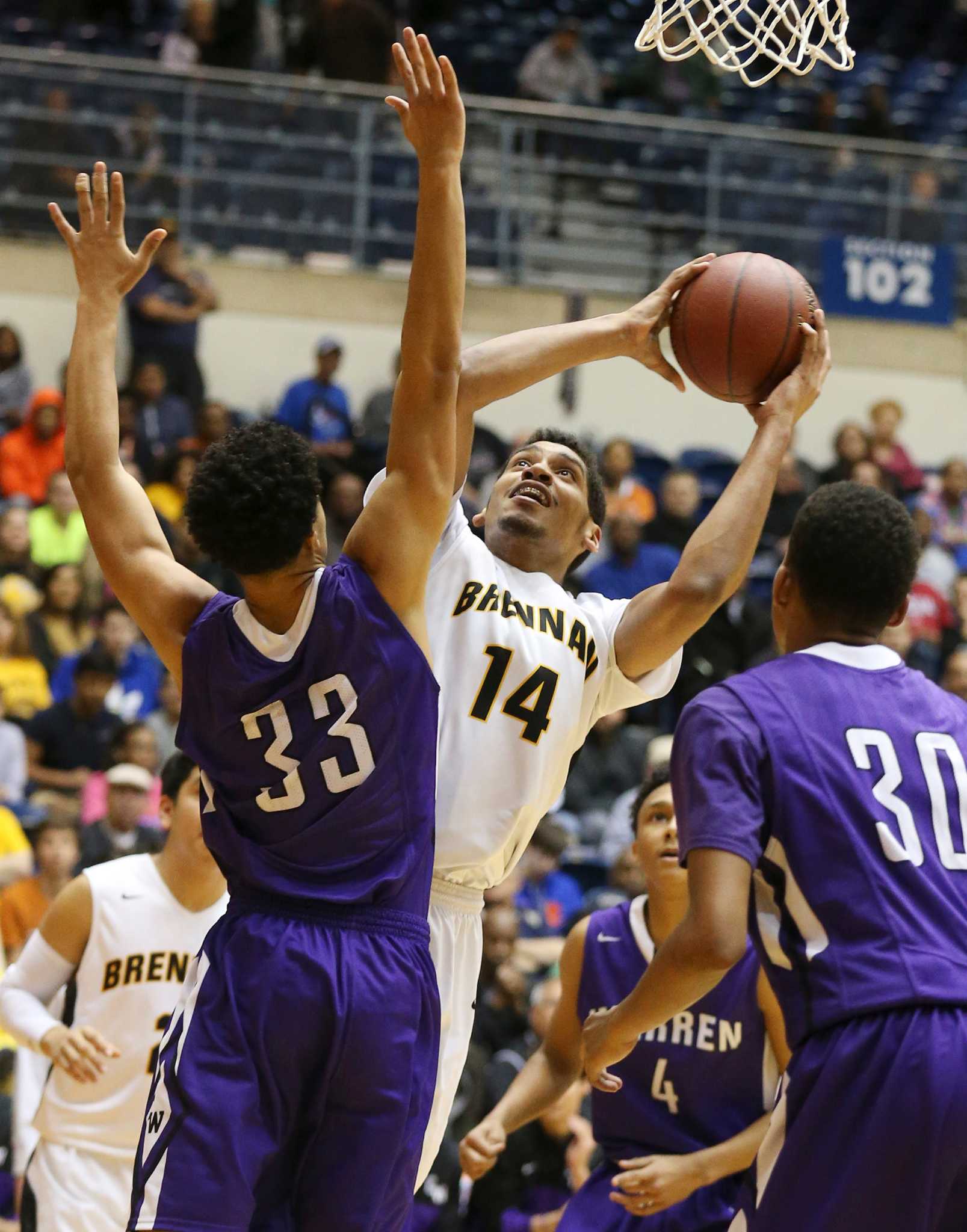 Warren beats Brennan to advance