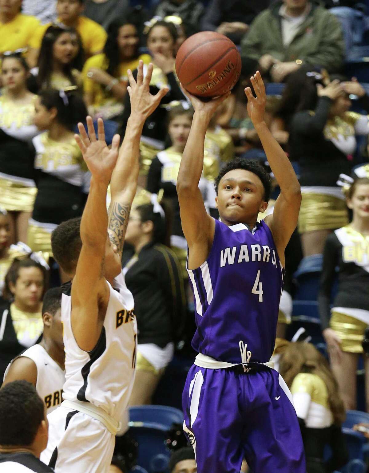 Warren beats Brennan to advance