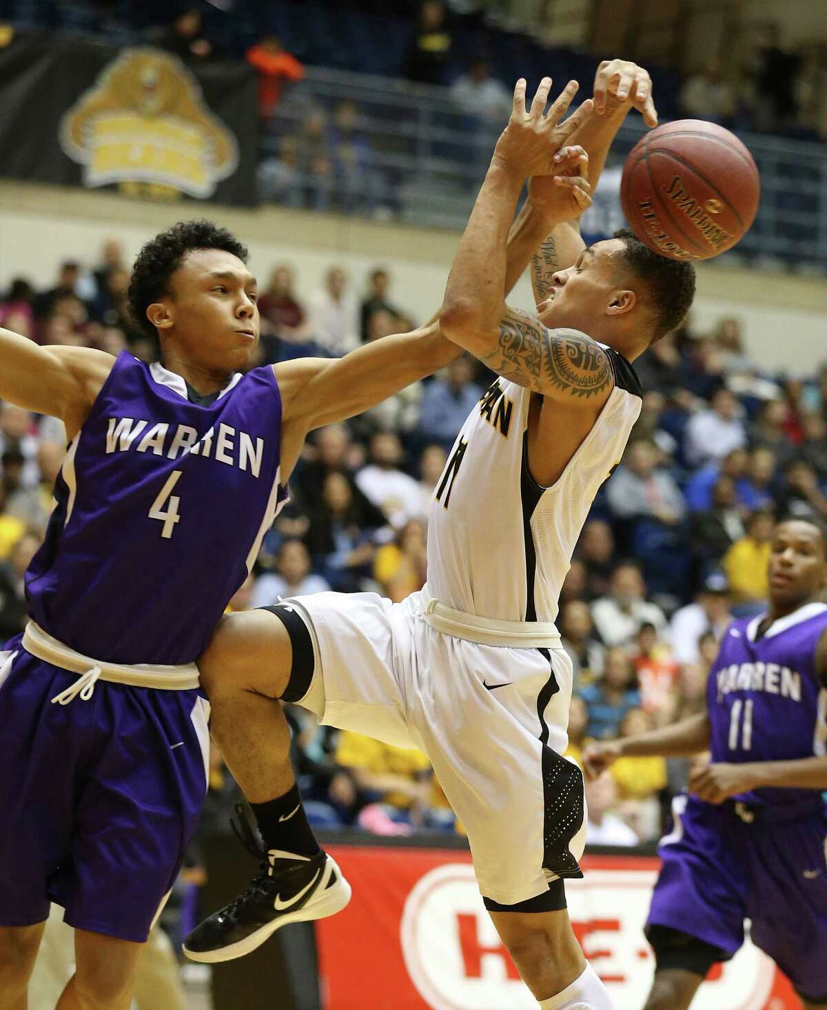 Warren beats Brennan to advance