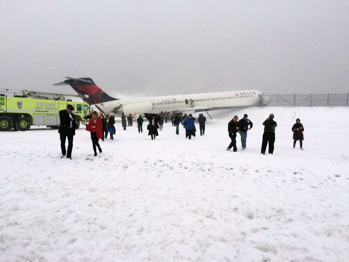 Airliner skids off runway