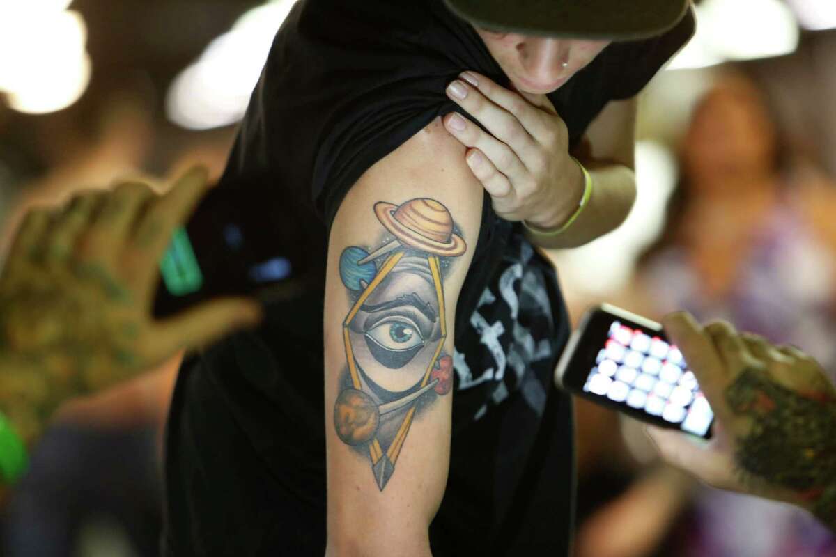 Hundreds turn up to show off ink at Tattoo Extravaganza