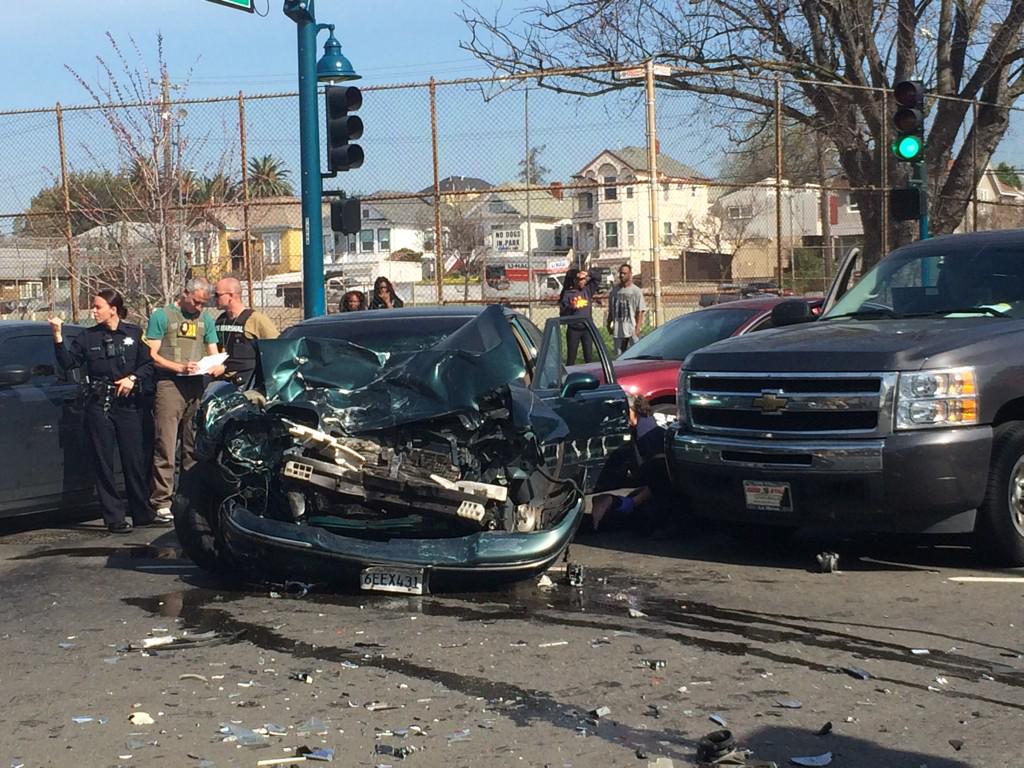 Car fleeing marshals slams into van in Oakland (photos)