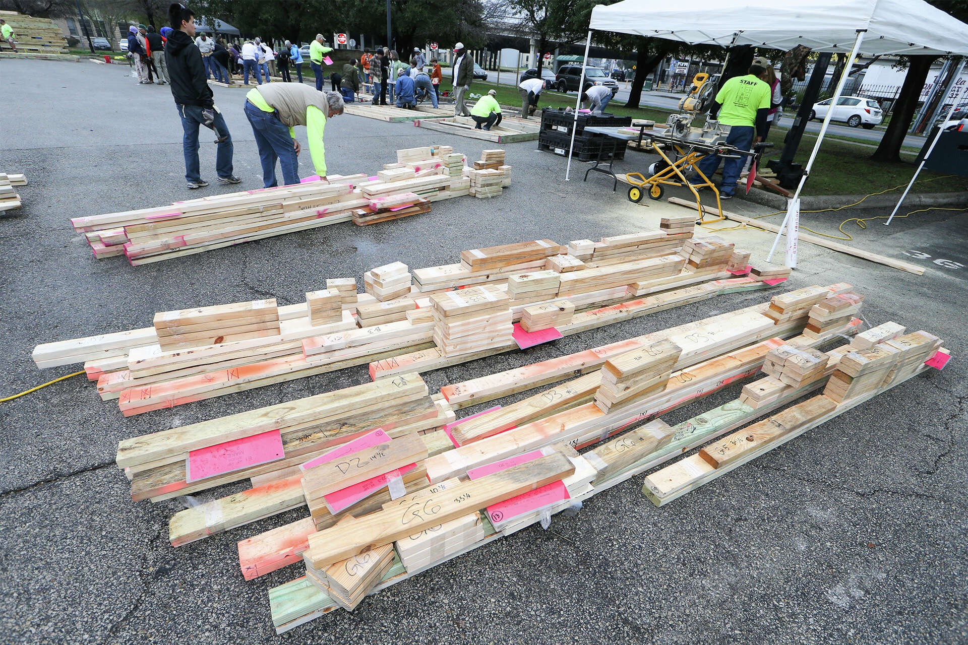 300 volunteers give 240 minutes for 5 houses