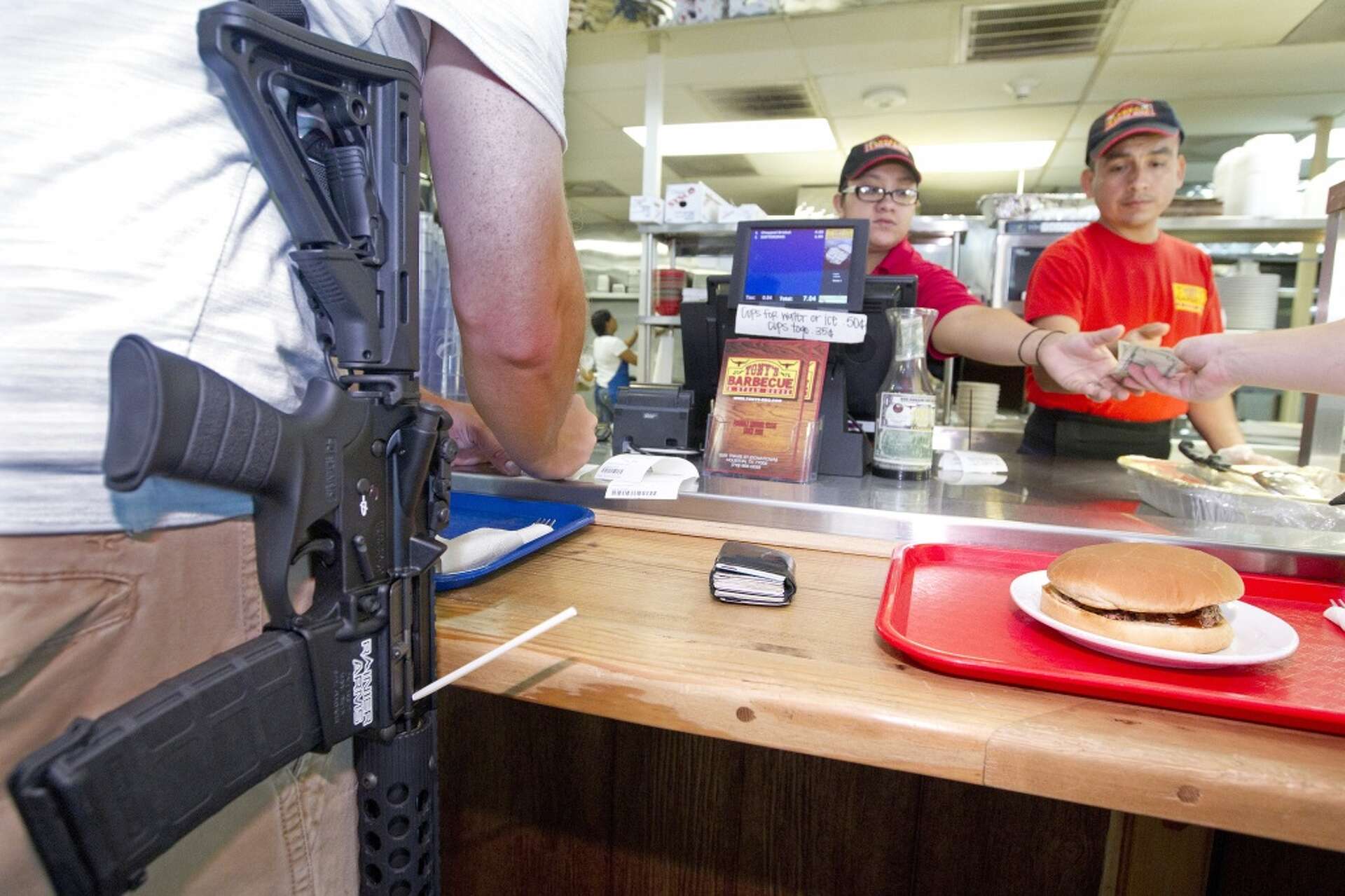 Texas Open Carry gun advocate, Walmart worker clash over handgun in store