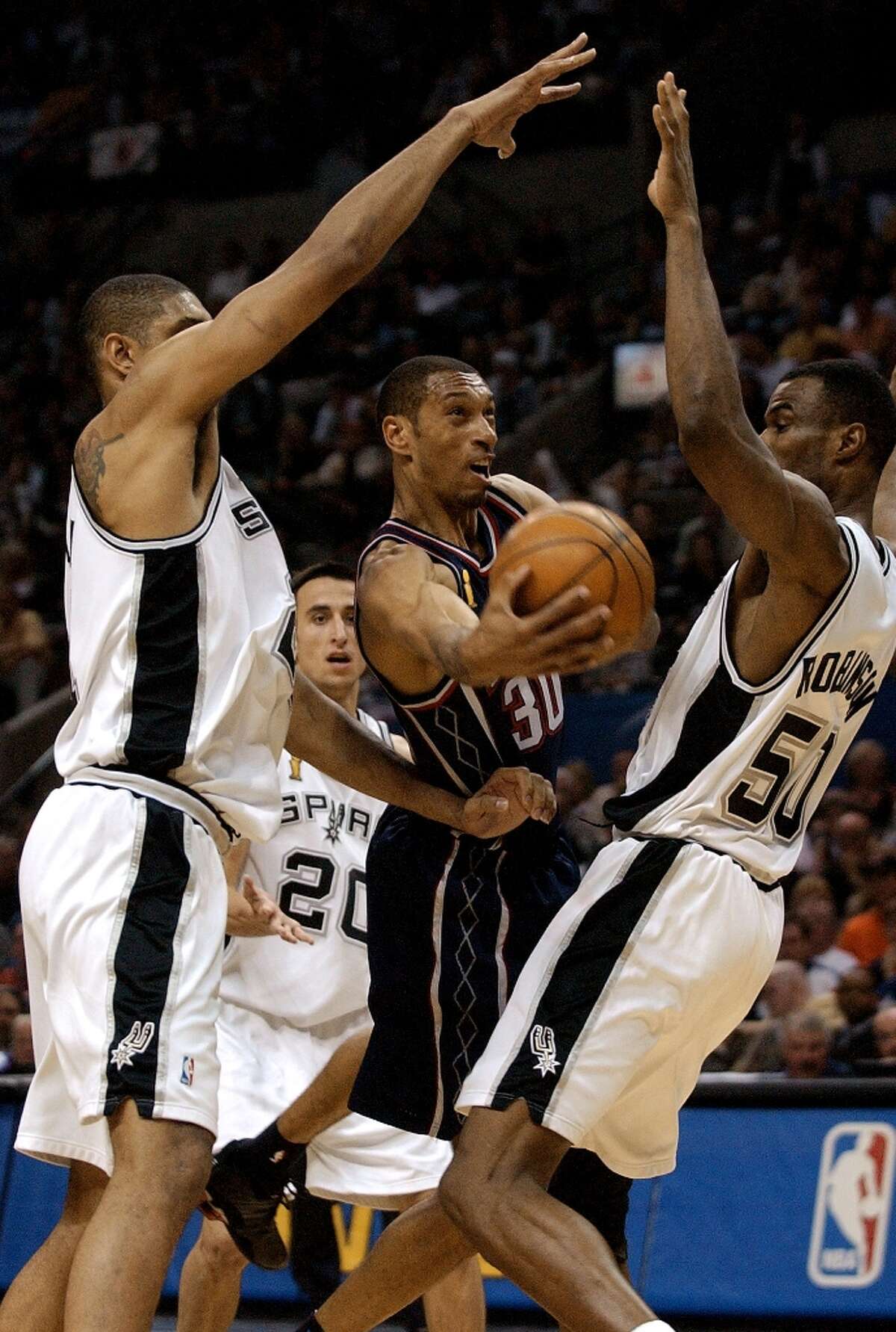 Photo shows Tim Duncan, David & Justin Robinson with San Antonio MMA ...